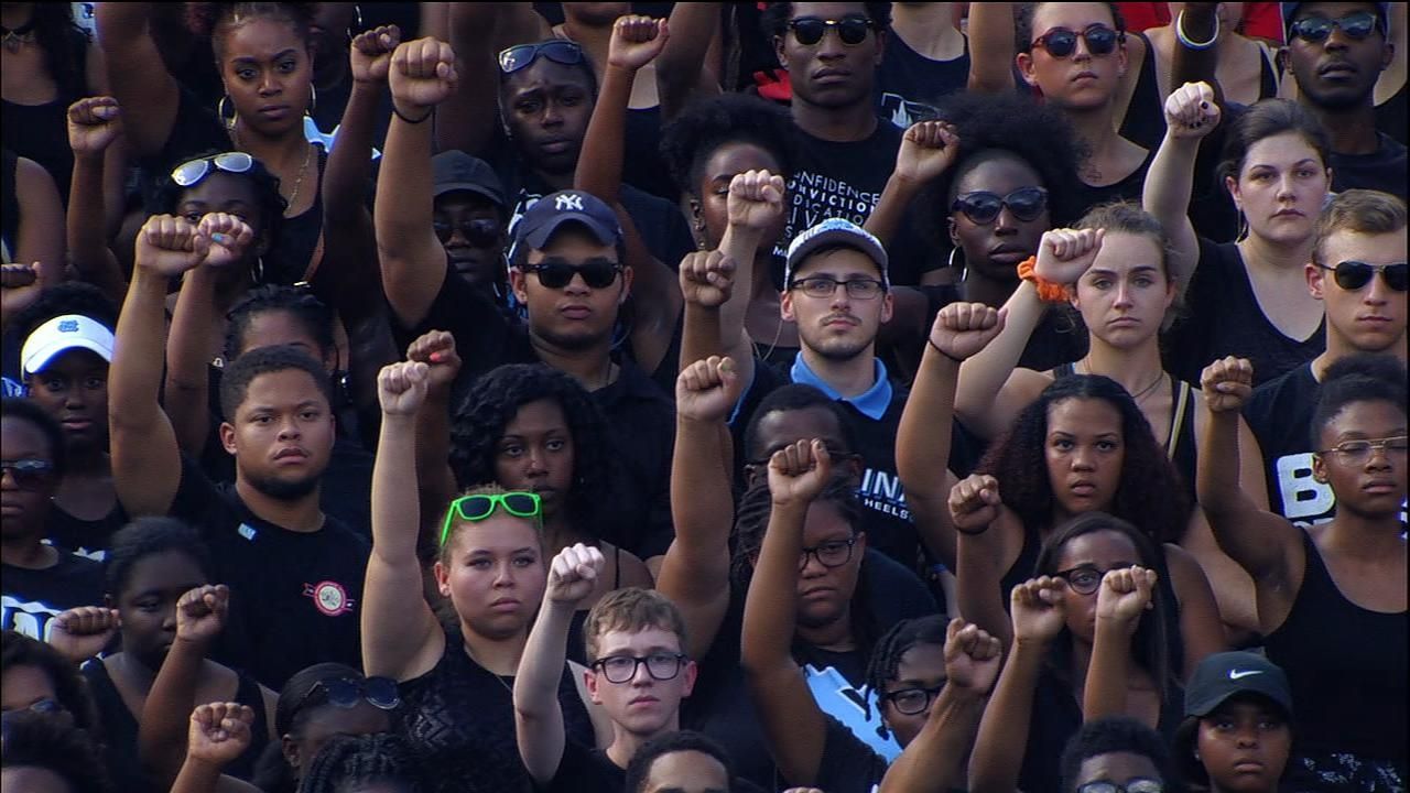 UNC fans, band protest during national anthem - ESPN Video