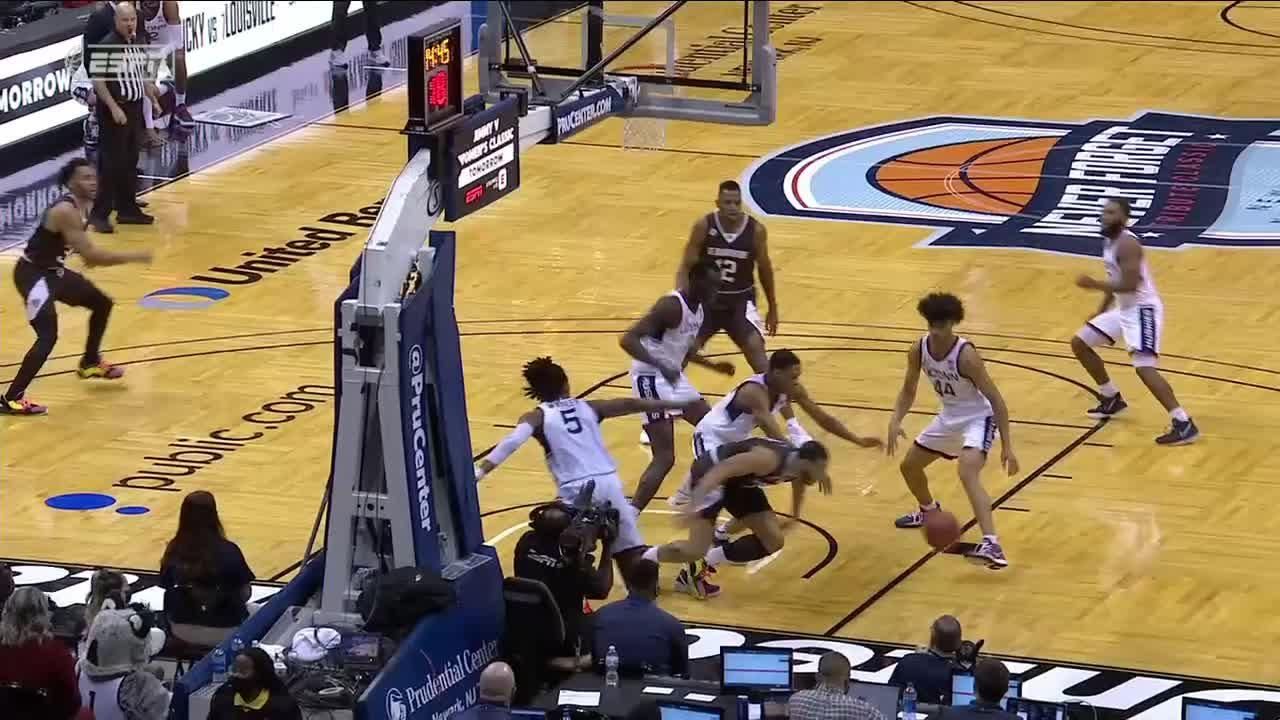 Isaiah Whaley and Jordan Hawkins elevate for the big-time block - ESPN ...