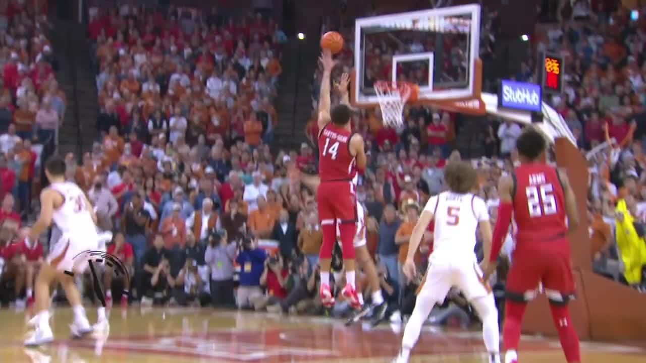 Marcus Santos-Silva flips in a hook shot to extend Texas Tech's lead ...