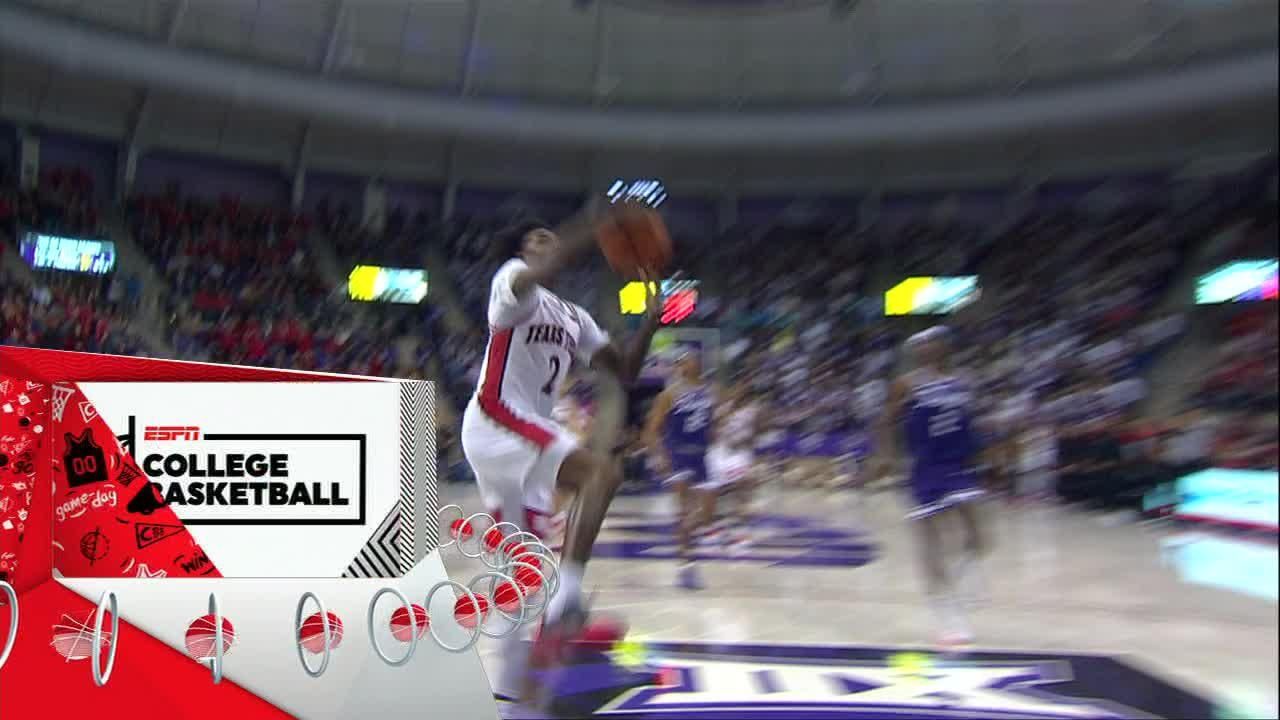 Davion Warren hauls in the rock and throws down the hammer for Texas ...