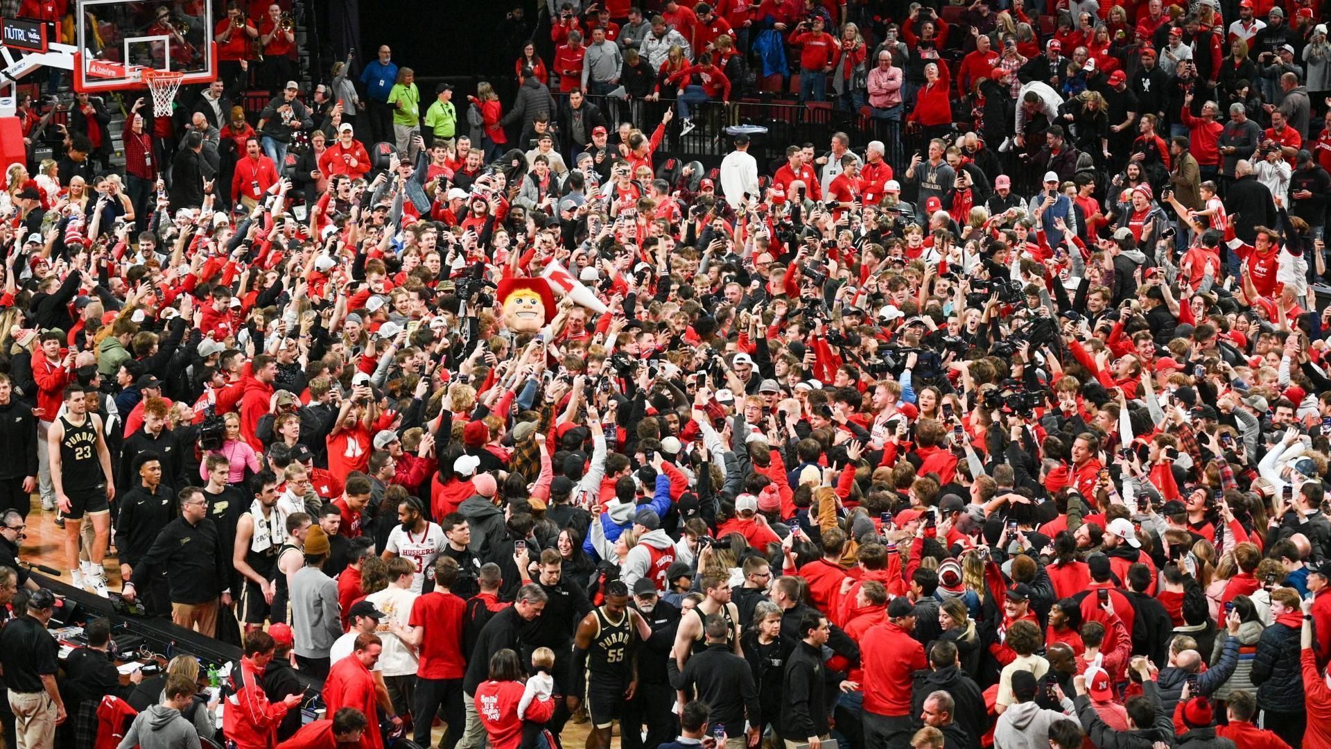 Nebraska fans rush the court after upset of top-ranked Purdue - ESPN Video