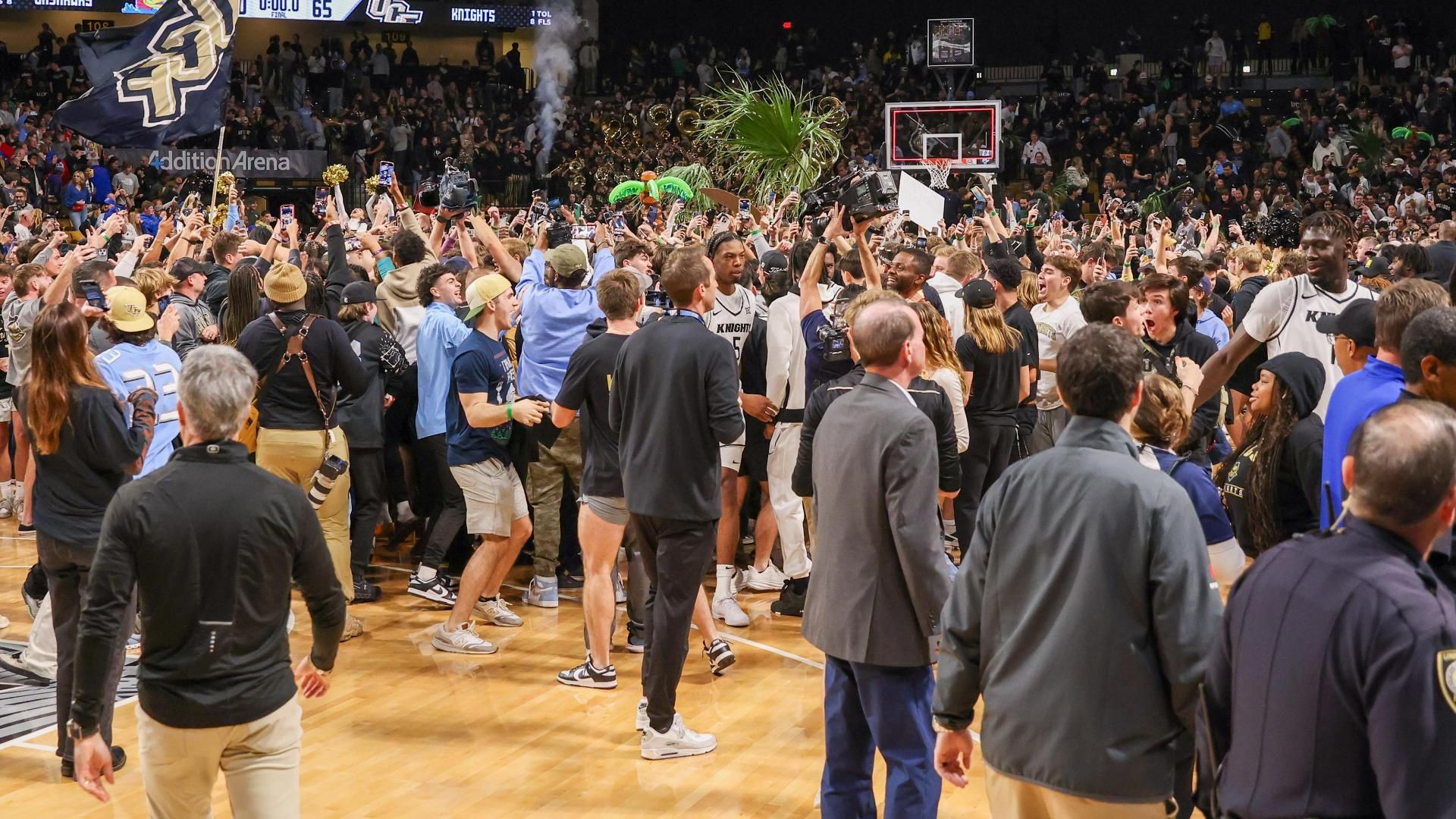 UCF fans storm court after win over No. 3 Kansas - ESPN Video