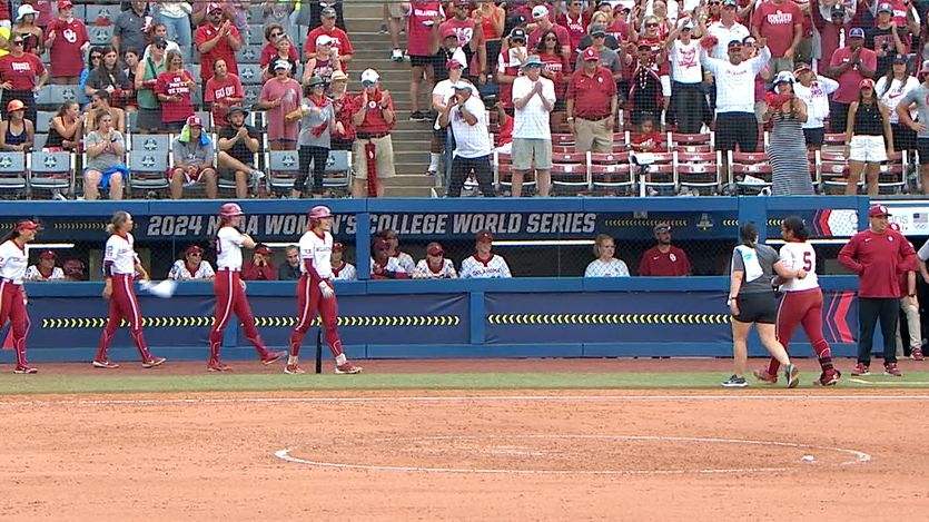 Oklahoma's Ella Parker walks off field after collision with Florida SS ...