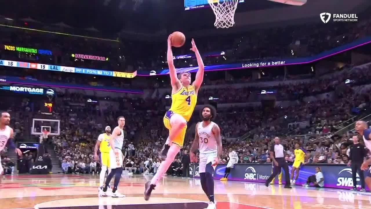 Dalton Knecht rocks the rim with powerful dunk - ESPN Video