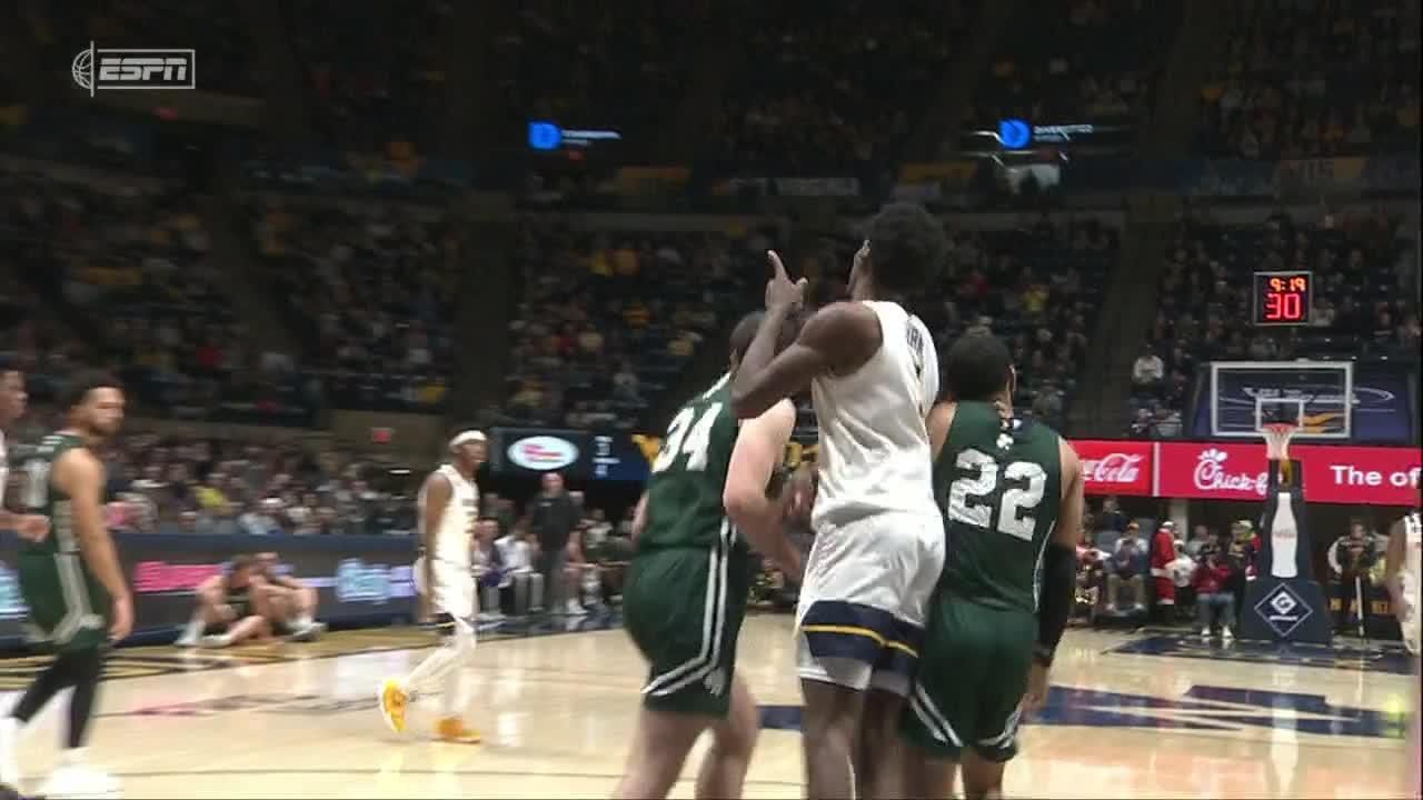 Toby Okani gets up for the beautiful dunk - ESPN Video