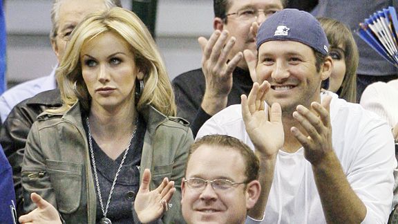 Caption this: Tony Romo and his fiancee watch the Mavericks beat the ...