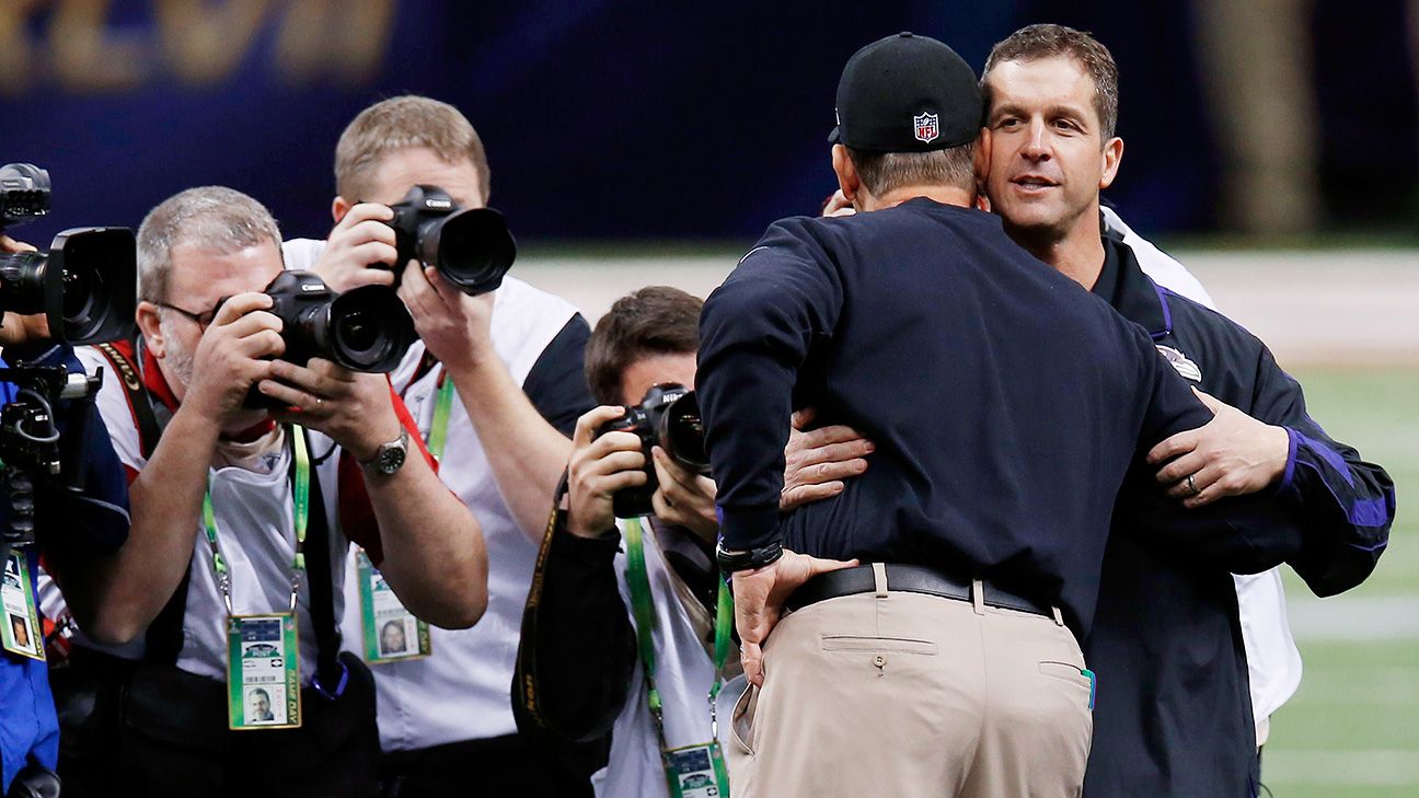 Harbaugh brothers a hit at Michigan football clinic - ESPN