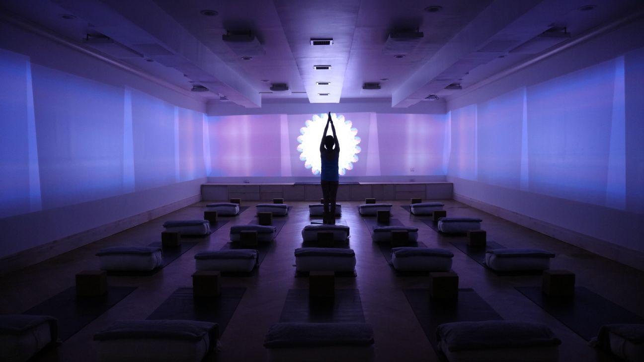 We tried it: Yoga with lights, music, scents -- and even an elixir shot ...