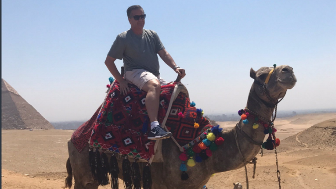 Kentucky Wildcats coach John Calipari rides camel and visits pyramids ...