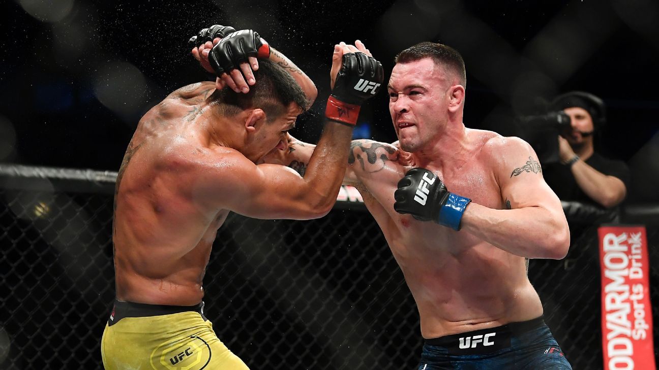 Colby Covington defeats Rafael dos Anjos to win UFC interim ...