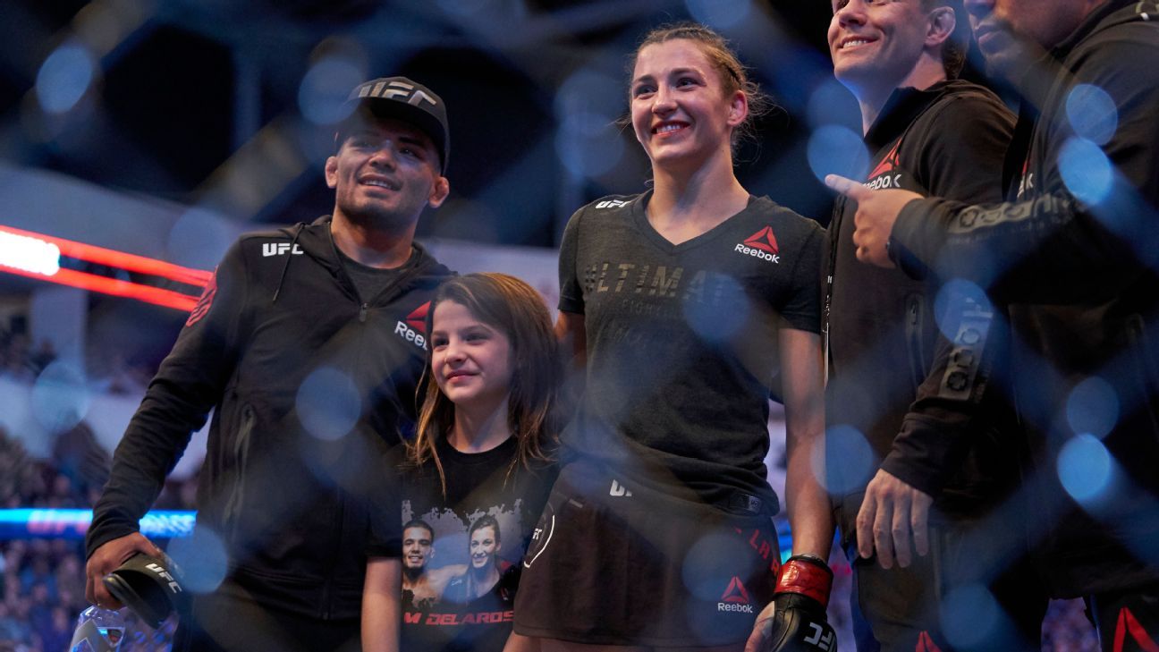 Photos - The power of love: This cage-fighting couple will battle on ...