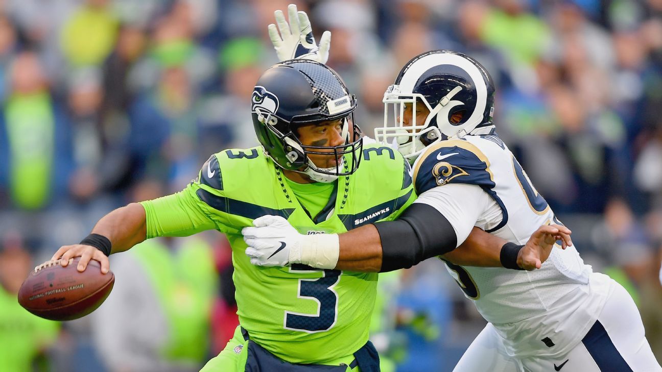 Seahawks have protected Russell Wilson, but here comes Aaron Donald ...