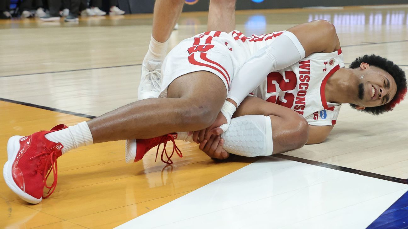 Wisconsin Badgers guard Chucky Hepburn on crutches after suffering ...