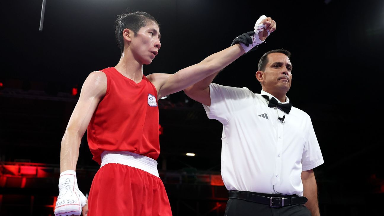 Taiwan's Lin Yu-ting wins first fight at Olympics amid controversy - ESPN