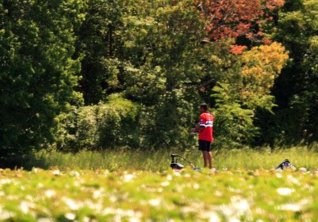 Jared Lintner fishes deep in the lily pads in the backwaters of the ...